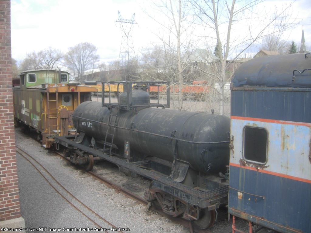 UP 5513, BNSF 9210 + MNTX Cars